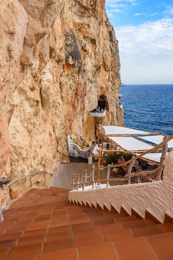 Seaside Cafe Bar in the Caves on the Island of Menorca, Spain Editorial ...