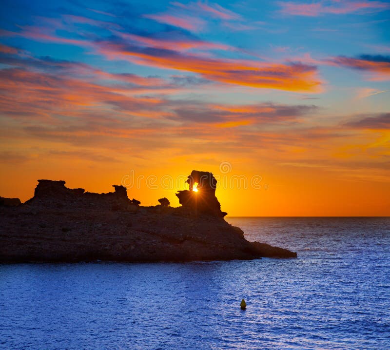 Menorca Sunset in Cala Morell at Ses Torretes Beach Stock Photo - Image ...