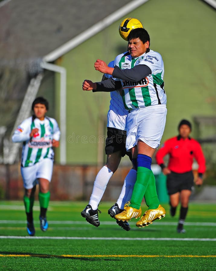 Mens club Soccer jumping editorial stock photo. Image of action - 12112108