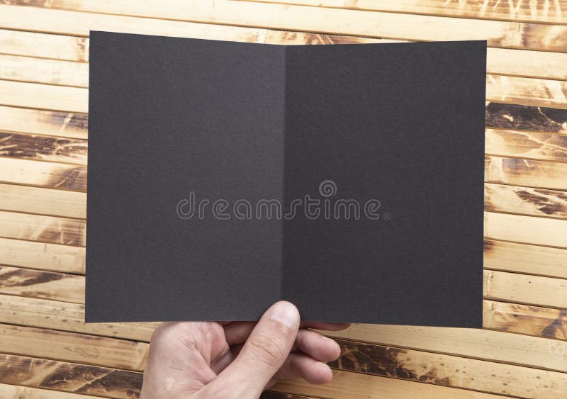 Mens Hand Holding Black Booklet Stock Photo - Image of booklet, clean ...