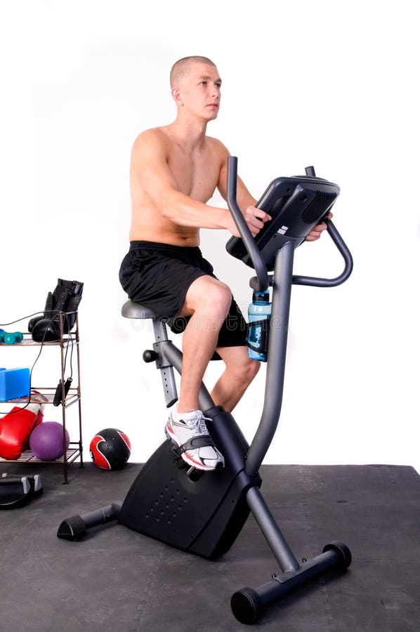 Mens Op De Fiets Van Oefeningen Stock Afbeelding - Image of rijden ...