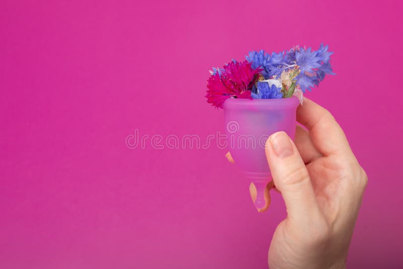Menstrual Cup with Flowers Inside, Feminine Hygiene Product Stock Photo ...