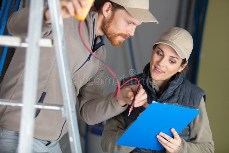 Mentor Supervising Female Electrical Engineer Stock Image - Image of ...