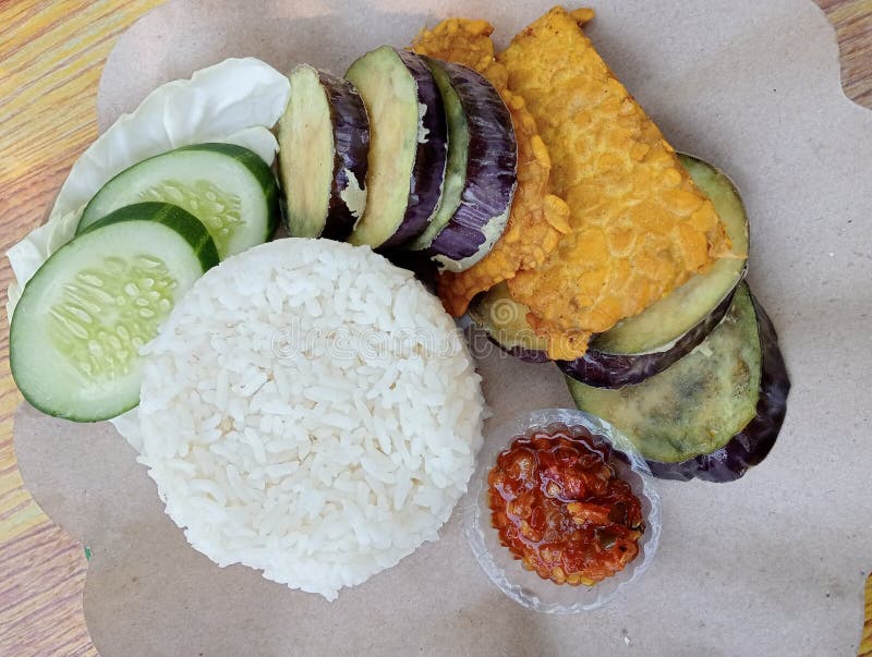 Menu Eating Rice with Fried Tempeh and Fried Eggplant Stock Image ...