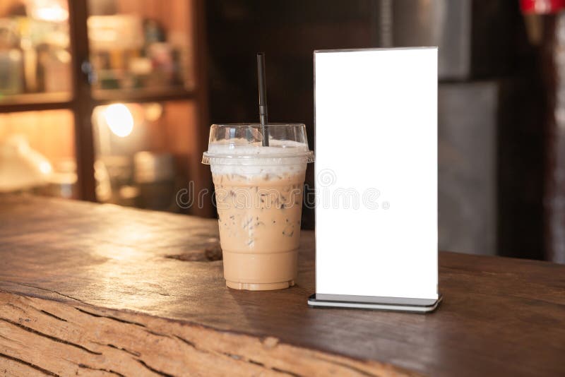 Menu Frame Standing on Wood Table in Coffee Shop. Stock Photo - Image ...