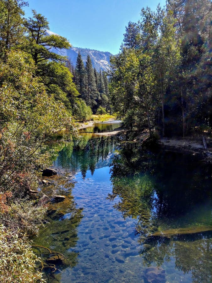 Merced river in Yosemite stock photo. Image of blue - 132111972