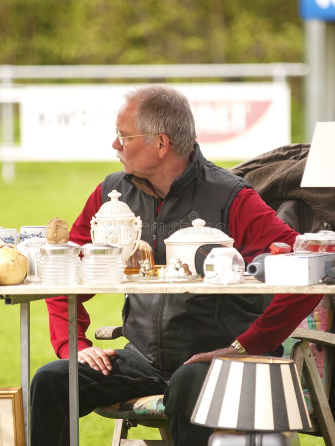 Merchant with a Flea Market Stall Stock Photo - Image of junk, merchant ...