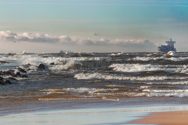 Merchant Ship Entering the Port for Unloading, Storm at Sea Stock Photo ...