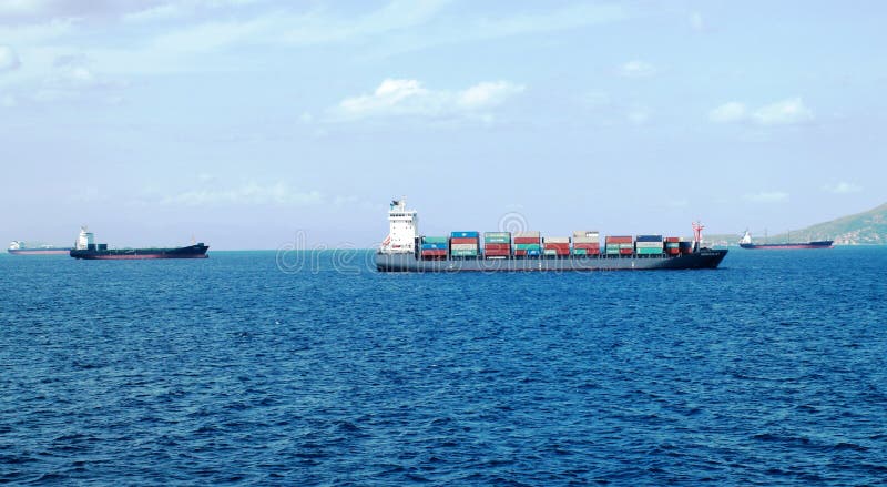Merchant Vessels and Cargo Container Ships Entering the Port Editorial ...