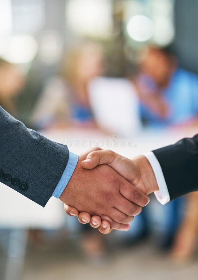 Merging Together. Shot of Businesspeople Shaking Hands. Stock Photo ...