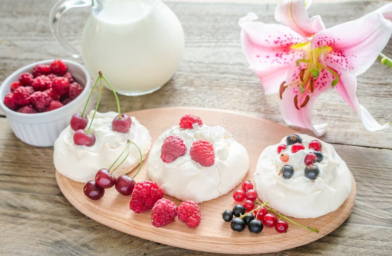 Meringue Cakes with Fresh Berries Stock Photo - Image of crust ...