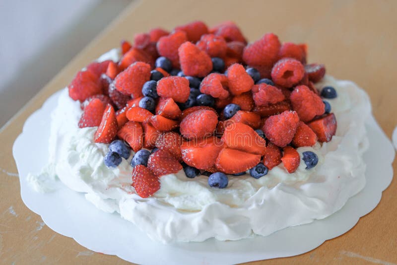 Meringue Pavlova Cake with Fresh Berries on Top. Stock Photo - Image of ...
