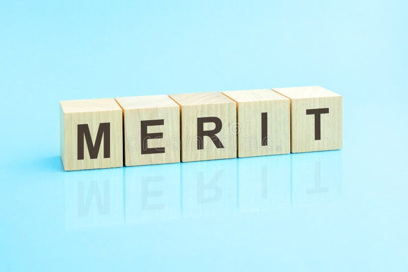 Wooden Blocks with the Word Merit, Blue Background Stock Photo - Image ...