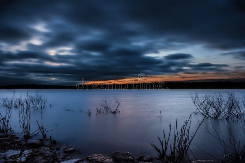 Merky Waters at sunset stock image. Image of event, modeling - 86342175