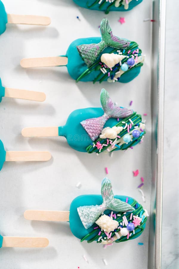 Mermaid cakesicles stock photo. Image of seashell, pastries - 285917888
