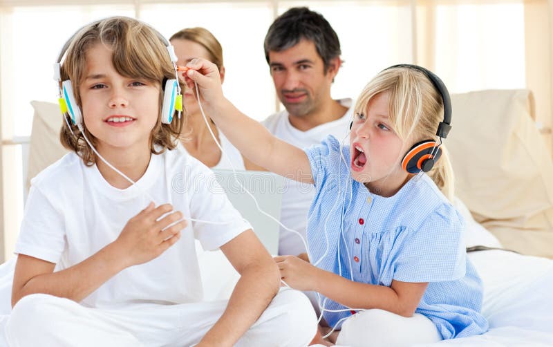 Merry Children Having Fun and Listening Music Stock Image - Image of ...