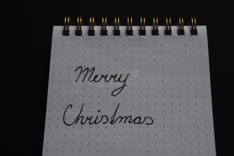 Merry Christmas Write in Notepad Stock Image - Image of dark, white ...