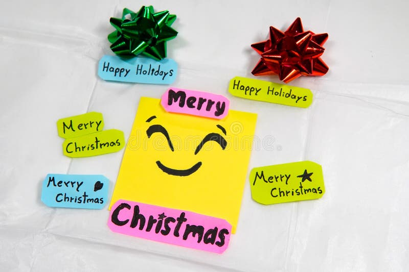 Merry Christmas! Write on Sticky Notes with Happy Face Stock Photo ...