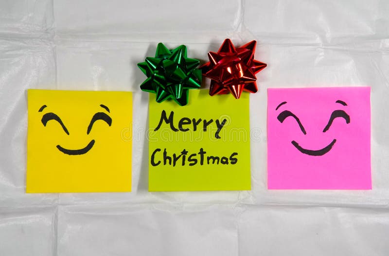 Merry Christmas! Write on Sticky Notes with Happy Face Stock ...