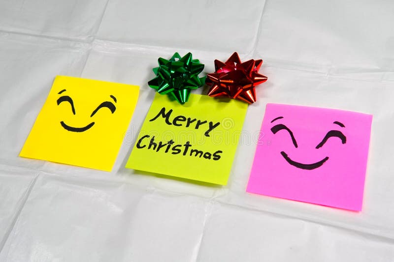 Merry Christmas! Write on Sticky Notes with Happy Face Stock ...