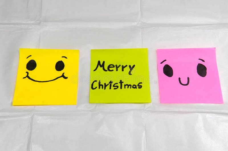 Merry Christmas! Write on Sticky Notes with Happy Face Stock ...