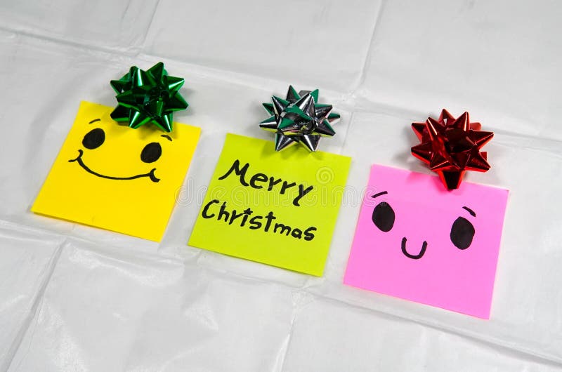 Merry Christmas! Write on Sticky Notes with Happy Face Stock ...