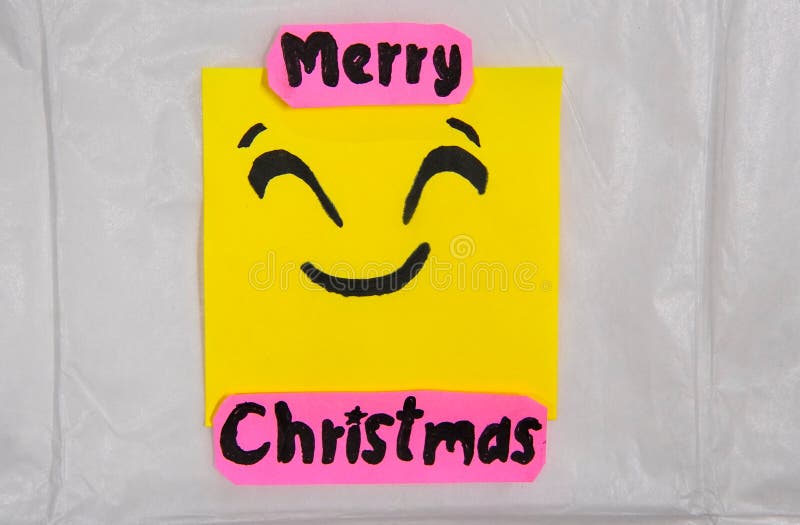 Merry Christmas! Write on Sticky Notes with Happy Face Stock Photo ...
