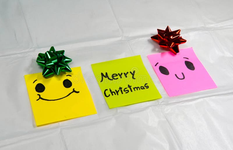 Merry Christmas! Write on Sticky Notes with Happy Face Stock ...