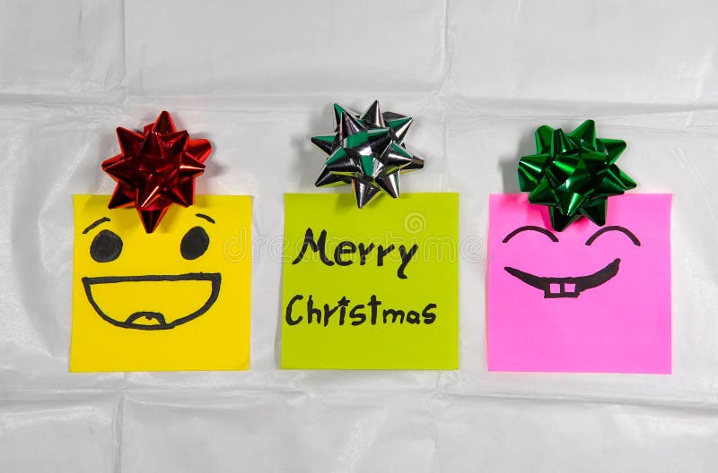 Merry Christmas! Write on Sticky Notes with Happy Face Stock Image ...