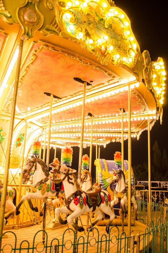 Merry-go-round at Fairground Stock Photo - Image of dark, bright: 71165646