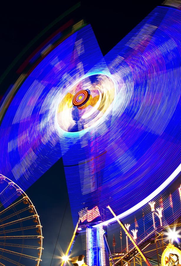 Merry Go Round with Ferris Wheel in the Background Stock Image - Image ...