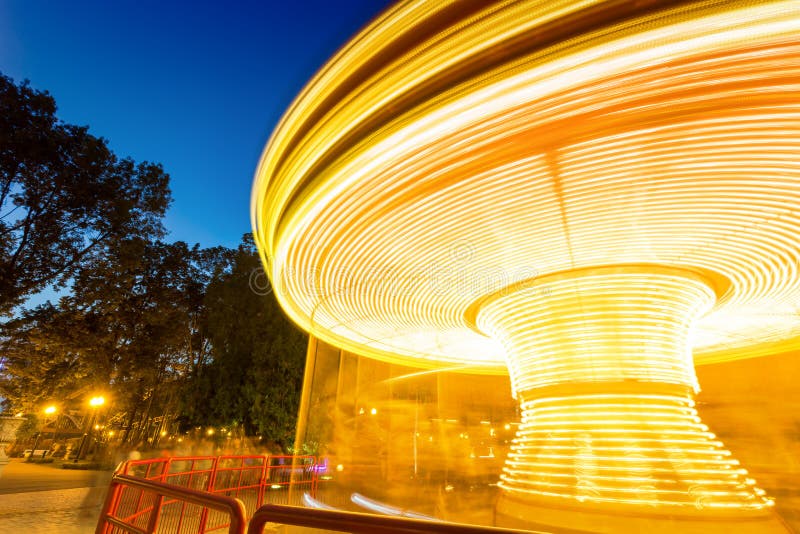 Merry-go-round light stock image. Image of popular, dark - 62638137