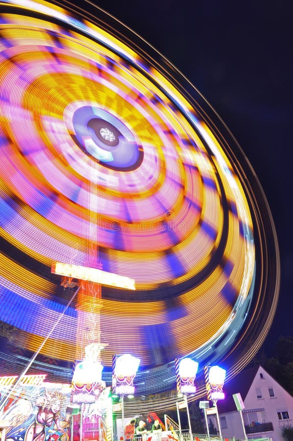 Merry-go-round at night stock photo. Image of night, fast - 56106684