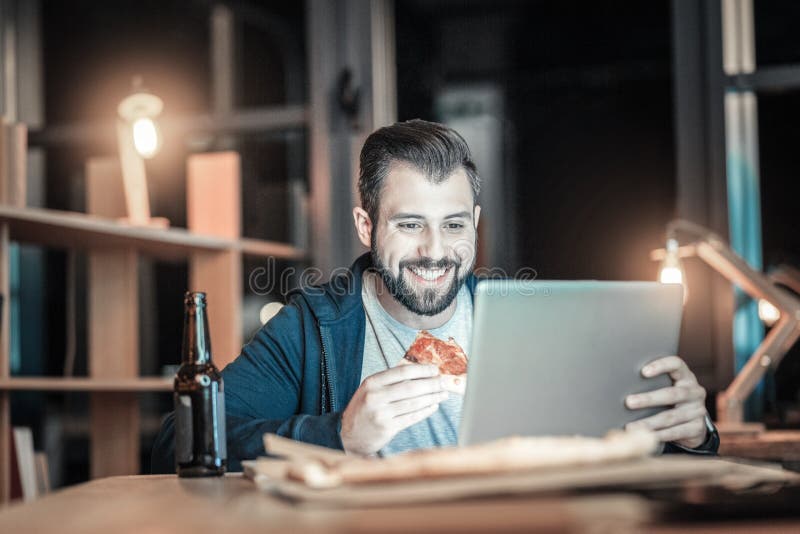Merry it Guy Devouring Pizza Stock Image - Image of programmer ...