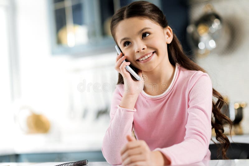 Merry Optimistic Girl Calling Mom with Phone Stock Image - Image of ...