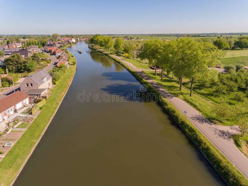 Merwede Canal Surrounded by the Trees and Buildings of the Village ...