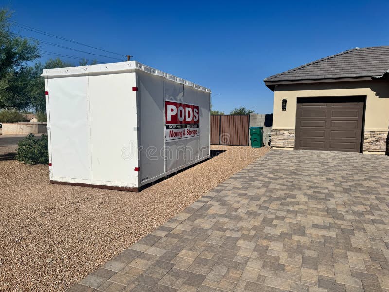 PODS Moving and Storage Container Placed at a Home Editorial ...