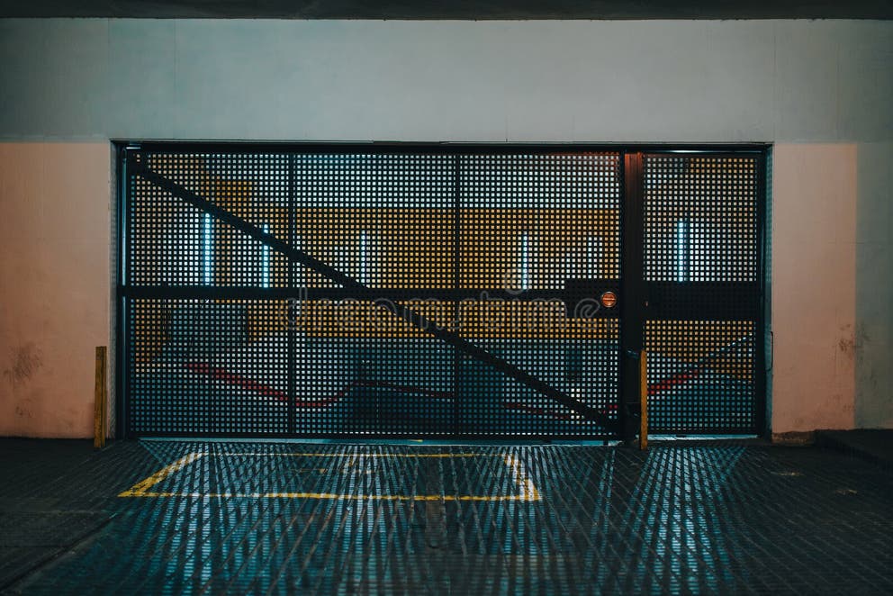 Mesh Gates on Underground Parking Stock Image - Image of automatic ...