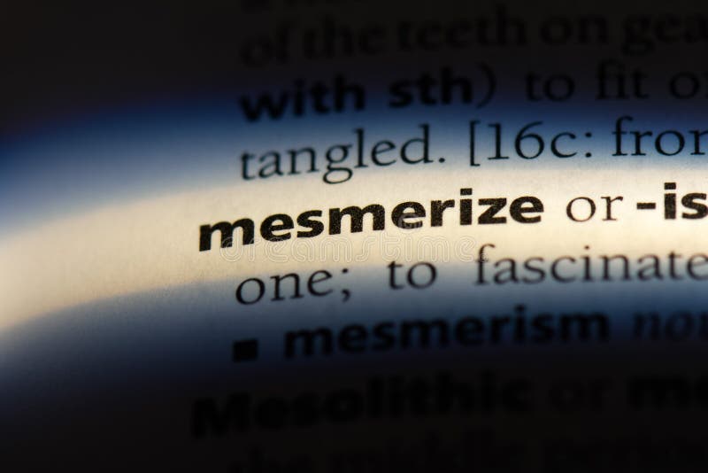 Mesmerize stock photo. Image of text, printed, paper - 126541122