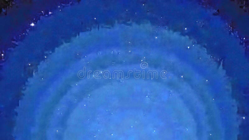 Mesmerizing Blue Circular Water Patterns with Sparkling Stars in Night ...
