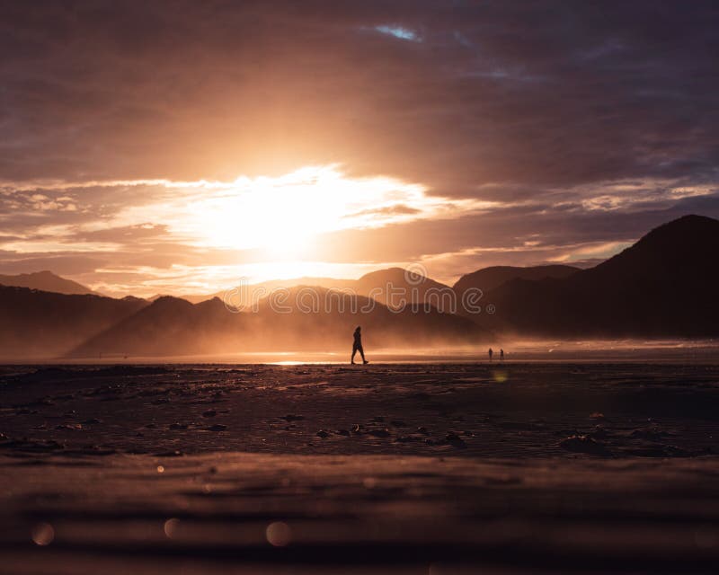 Mesmerizing Breathtaking Sunrise Over a Mountainous Scenery Stock Photo ...