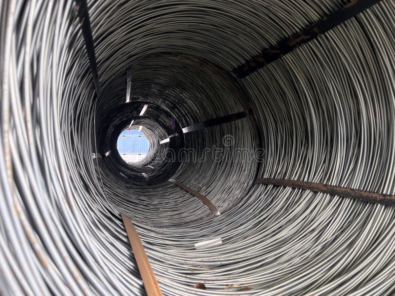 A Mesmerizing Interior View of a Large, Spiraling Metallic Wire Mesh ...