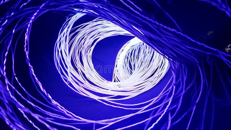Mesmerizing Light Effects from Spinning Fiber Optic Cables Stock ...