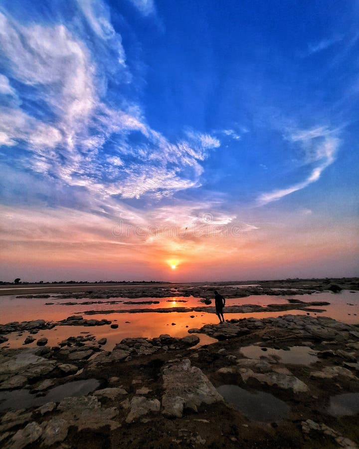 Mesmerizing Reflection of Sunset in River Water Stock Photo - Image of ...