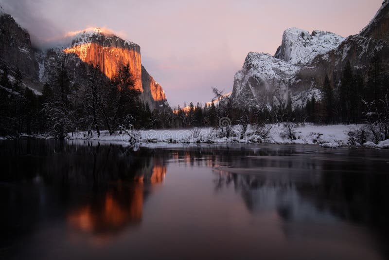 Mesmerizing Scenery of a Reflection of Snowy Mountains in the Lake ...