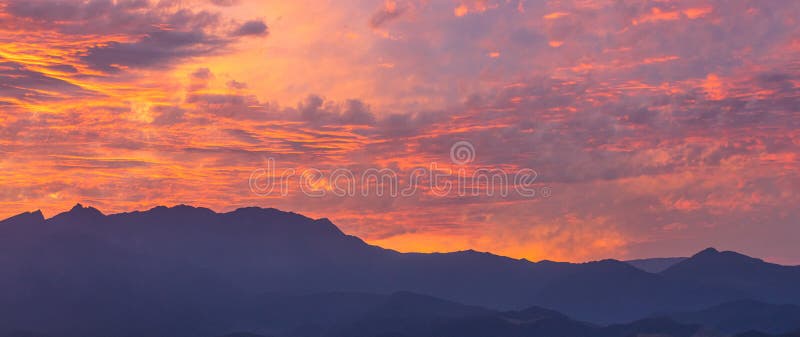 Mesmerizing Shot of a Beautiful Sunset Sky Over the Mountains Stock ...