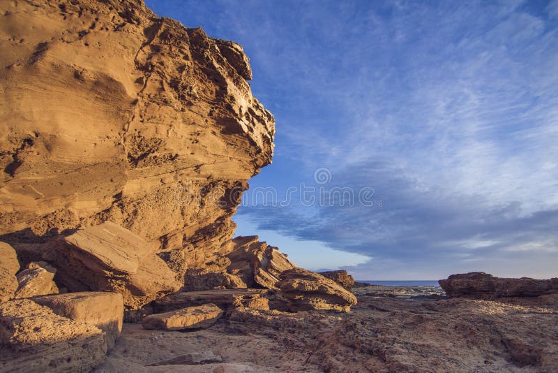 Mesmerizing Shot of a Coastal Cliff Area Under the Blue Vibrant Sky ...