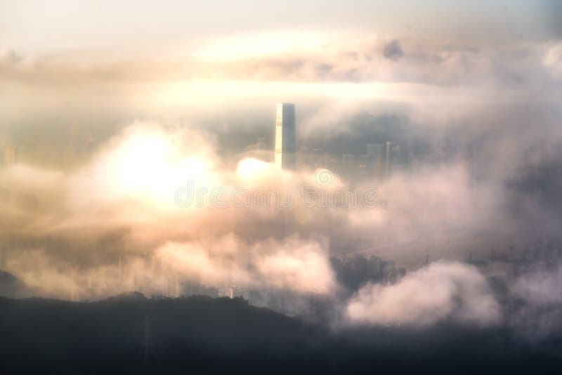 Mesmerizing Shot of the Skyscrapers of a City Covered in Mist Stock ...