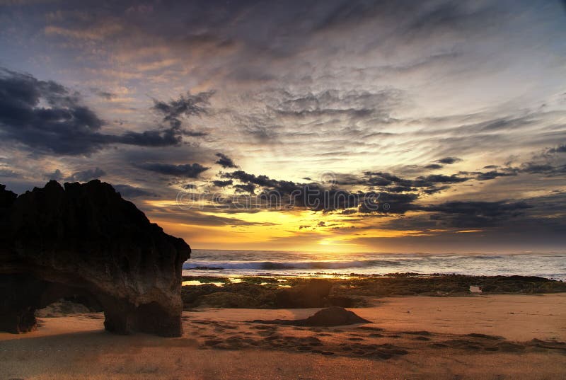 Mesmerizing Sunset Over the Beautiful Coast Stock Image - Image of ...