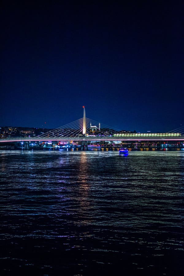 Mesmerizing Vertical of the Bosphorus Bridge Illuminated at Night and a ...